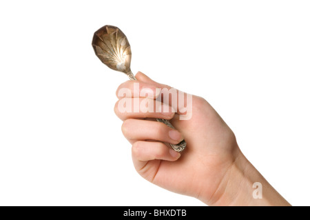 hand holding silver spoon Stock Photo - Alamy