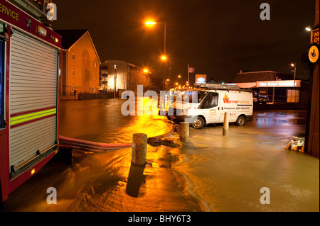 Fire service pumping out flooded cellar using AWG Ejector pump Stock ...