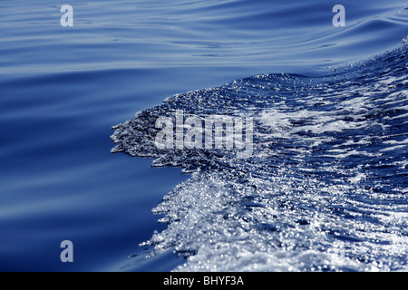 Blue water textures, waves foam, action, sea Stock Photo - Alamy
