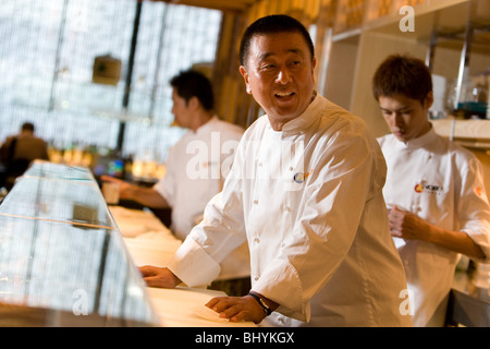 Chef and owner of 'Nobu' restaurants, Nobuyuki Matsuhisa (centre of ...