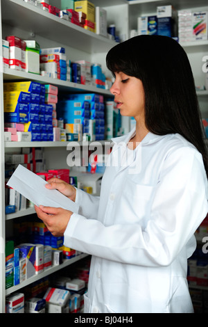 Hispanic woman working at pharmacy drugstore crazy and mad shouting and ...