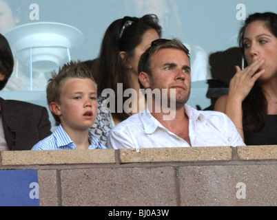 Gary Barlow of Take That and his son Daniel watching the game during ...