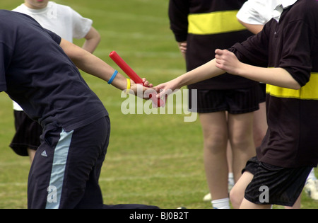 Track and field relay baton pass Stock Photo: 49183590 - Alamy