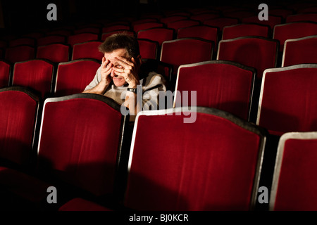 portrait of spectator watching theatre play Stock Photo, Royalty Free ...