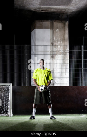 portrait of street football player Stock Photo - Alamy
