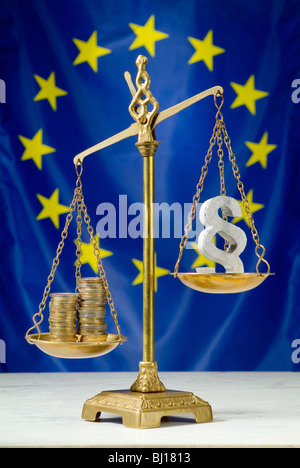 Balance scale with coin stacks. Money management, time value of money ...