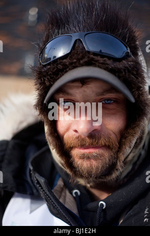 Defending Iditarod champion Lance Mackey watches musher Sebastian ...