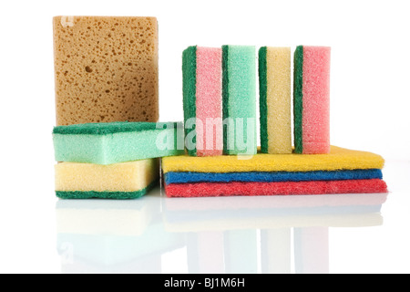 Pile of sponges isolated on white background Stock Photo - Alamy