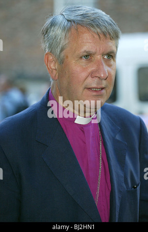 Bishop of Leicester Rt Rev Tim Stevens (left) assisted by Vicar Barry ...