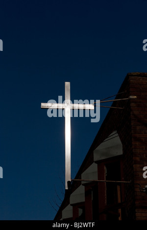 christian church building, cross on top, 2 fishes statue in front Stock ...