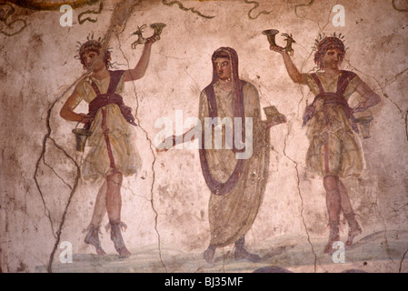 The Lararium wall paintings in the House of the Vettii in Pompeii Italy ...