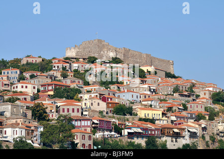 Medieval castle of Molyvos, Lesvos island, Greece and the Greek flag ...