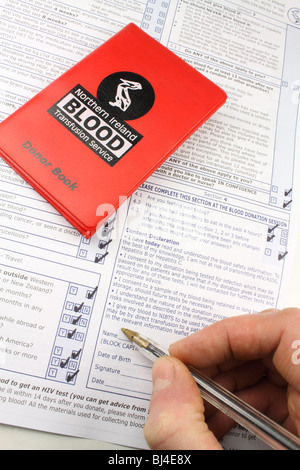 Completing a consent form for the blood transfusion service Stock Photo ...