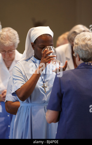 A Catholic Mass celebrating a nun joining a religious order Stock Photo ...