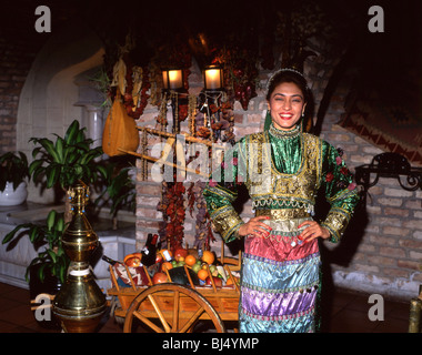 Waitress in national dress, Turkish restaurant, Istanbul, Republic of ...