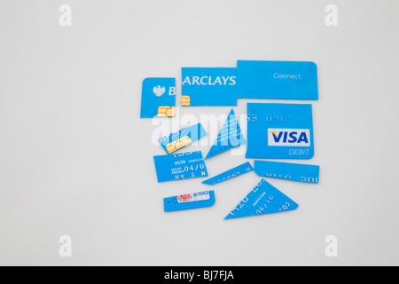 A Barclays bank Visa debit card cut up into pieces England uk Stock ...
