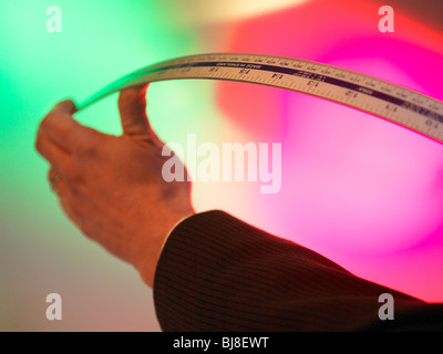 Hands Bending Ruler Stock Photo - Alamy