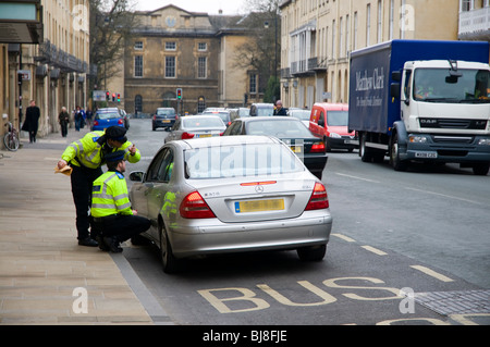 Community police officers helping a motorist with directions in Oxford ...