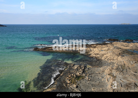 Glorious late summer/early autumn day at Harlyn Bay, surfers/beachgoers ...