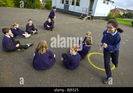 "I wrote a letter to my love" traditional playground game being played ...