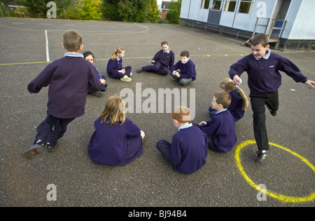 "I wrote a letter to my love" traditional playground game being played ...