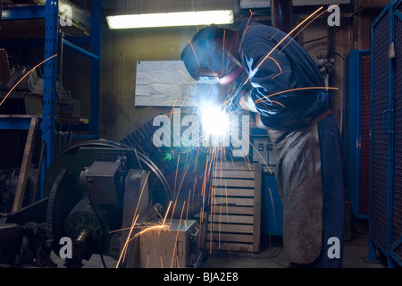 Factory, worker, weld, Germany, welding works, safety helmet, hard hat ...