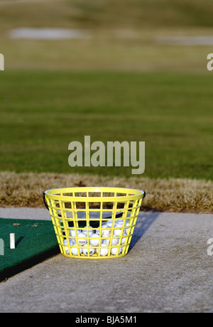 Bucket of Golf Balls Stock Photo - Alamy