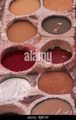 Dyeing pits in the traditional tannery in the historic town centre or ...