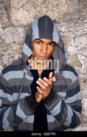 Young handsome man wearing sweatshirt over isolated background Posing ...