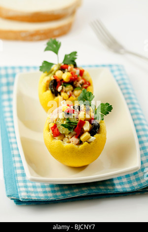 A vertical shot of sliced lemons on the wooden background Stock Photo ...