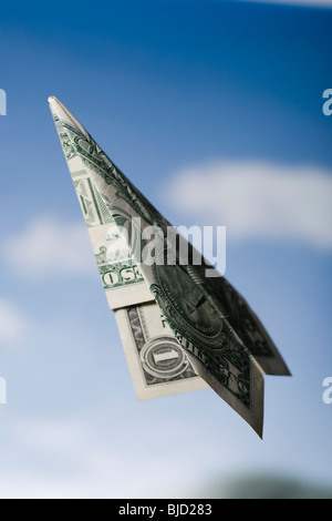 Paper airplane made out of money Stock Photo - Alamy