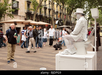 street statue entertainers, man sitting on toilet in Las Rambals ...