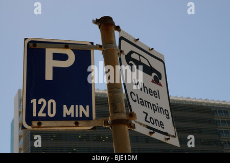 Car parking time limit signs in both English and Welsh in a Waitrose ...
