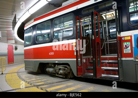 A Bus waiting for passengers at the station under trees in Meulan-en ...