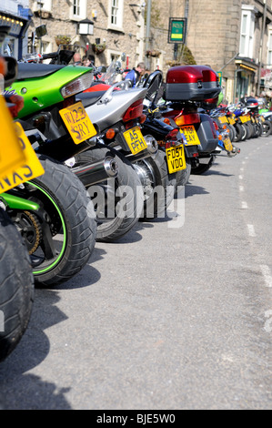 Motorcycles parked in the street at Matlock Bath village Derbyshire ...