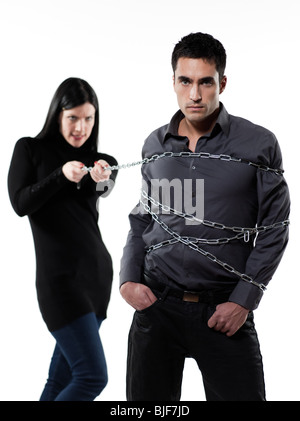 woman binding his man with a chain on white background Stock Photo - Alamy