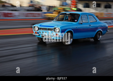 Ford Escort Mk1 race car racing up the hill climb at the Goodwood ...