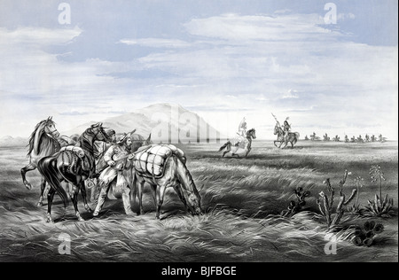A Native American Indian man riding bareback on a horse in the prairie ...