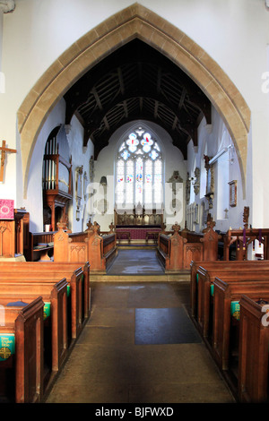 Inside view of an english village church looking up the knave towards ...