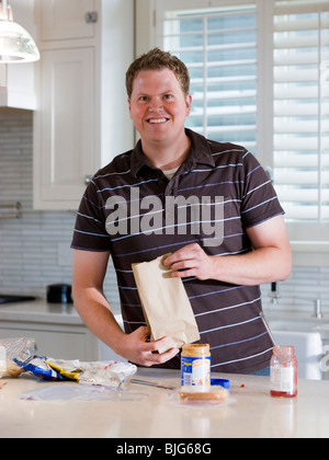 man making a school lunch Stock Photo - Alamy