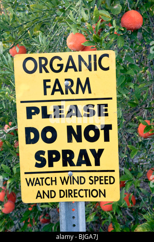 Sign 'Organic Farm - Please Do Not Spray' Stock Photo - Alamy