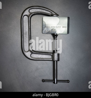 Credit card in a G Clamp Stock Photo - Alamy