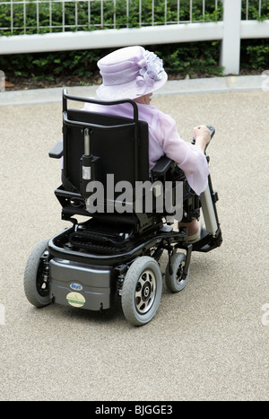 Man with disability on electric wheelchair exit a train. Accessible ...