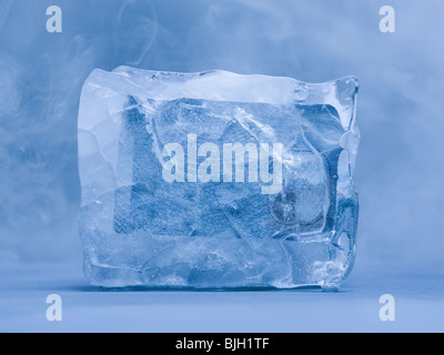 credit card frozen in a solid block of ice Stock Photo - Alamy