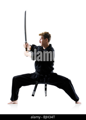 Man practicing martial arts with swords Stock Photo - Alamy