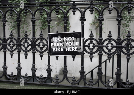 Do not chain bicycles to railings sign, warning sign, London cyclist ...