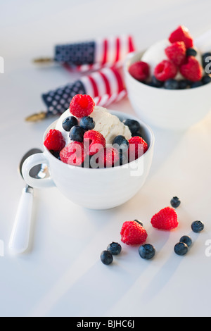 A vertical shot of a vanilla ice cream on the white background Stock ...