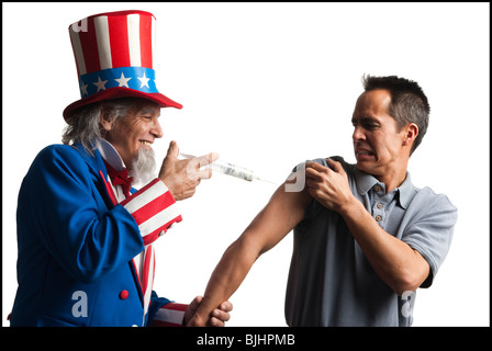 uncle sam giving a man an injection Stock Photo - Alamy