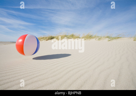 Beach ball. Colorful inflatable ball floating in swimming pool. Summer ...