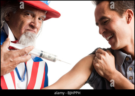 uncle sam giving a man an injection Stock Photo - Alamy